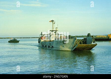 Soldiers from US 199th Light Infantry Brigade unload from landing boats ...