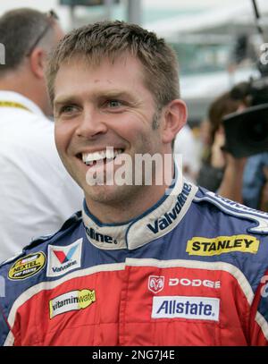 NASCAR driver Scott Riggs awaits his turn to qualify for the Ford 400 ...