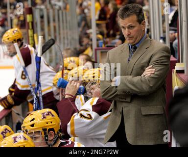 Minnesota head coach Don Lucia coaches his team during the first period ...