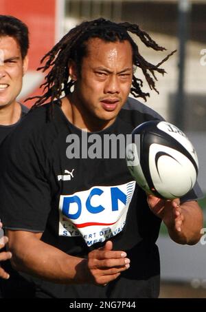 New Zealand rugby player Tana Umaga, left, former captain and center of ...