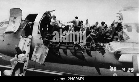 A pilot standing in front of the doorway of a plane Stock Photo - Alamy