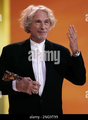 French actor Pierre Richard acknowledges applause after he received an ...