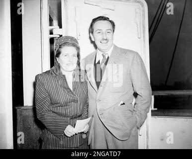 WALT DISNEY and his Wife LILLIAN MARIE BOUNDS DISNEY on arrival for a ...