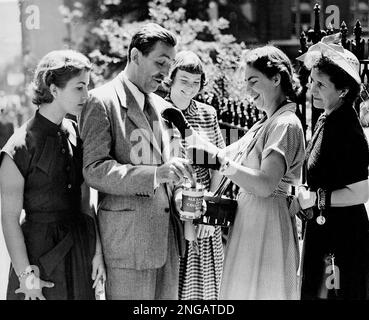 WALT DISNEY and his Wife LILLIAN MARIE BOUNDS DISNEY on arrival for a ...