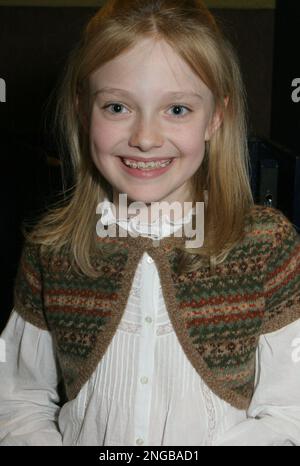 Dakota Fanning poses arrives for a special screening of her new film ...