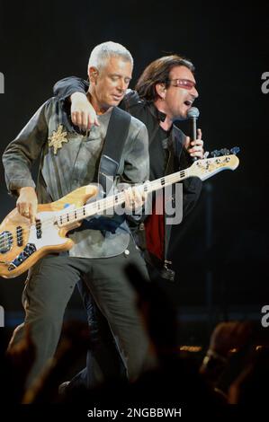Bass player Adam Clayton of U2 performing at the sports palace in ...