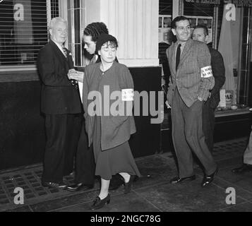 Dorothy Parker and her husband Alan Campbell are shown with their dog ...