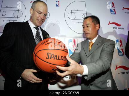 Gold medalist Chinese basketball players pose at the award ceremony of ...