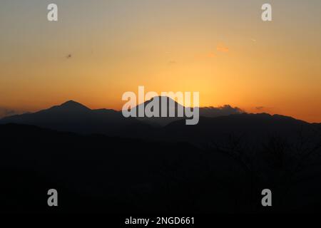 Sunset over Mount Fuji viewed from Mount Takao in Tokyo, Japan Stock ...