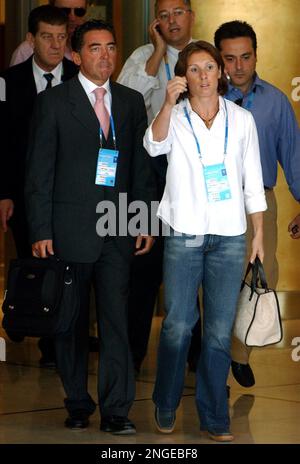 Greek sprinter Katerina Thanou, right, and coach Christos Tzekos appear ...