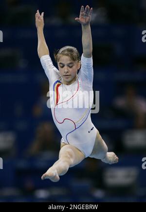 Romania's Eremia Alexandra performs in the beam final at the DTB Cup ...