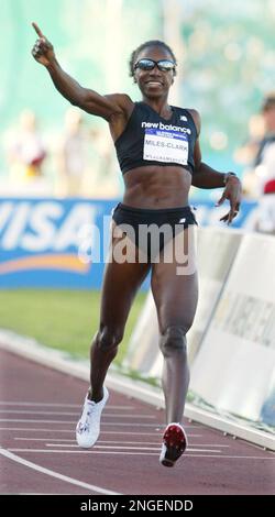 Jearl Miles-Clark celebrates her first place victory in the women's 800 ...