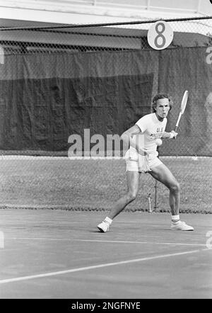 Dr. Richard Raskind prepares to return the ball during a tennis match ...