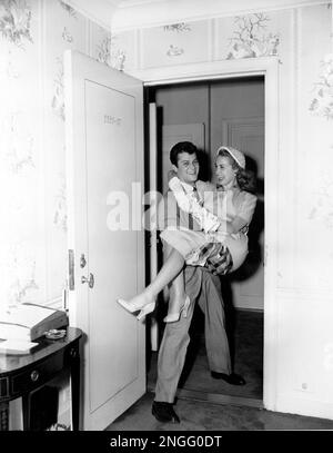 Actor Tony Curtis and his new bride, actress Andrea Savio, pose at ...