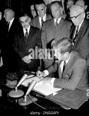 PRESIDENT JOHN F KENNEDY signs the Nuclear test Ban Treaty 7 October ...