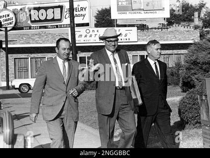 Neshoba County Deputy Sheriff Cecil Price puffs a cigar and wears a ...