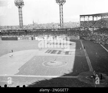 St. Louis Cardinals' Marty Marion holds his Kensaw Mountain Landis ...