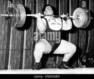 Paul Anderson lifts 320 pounds during the 1955 weightlifting World ...