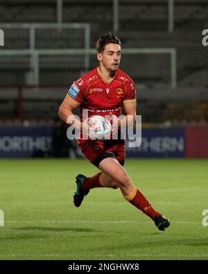 Arthur Mourgue #1 of Catalans Dragons is tackled by Ethan Havard #16 of ...