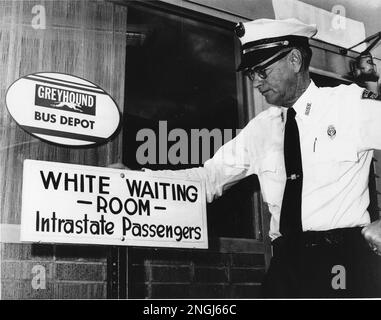 Segregation. Greyhound bus terminal with a "White Only Waiting Room ...