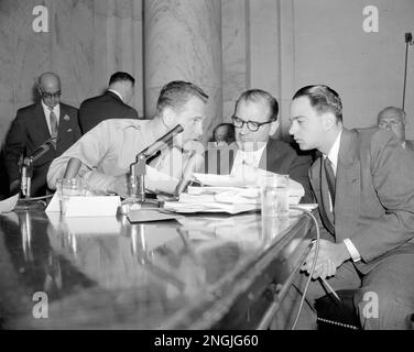 David Schine (left), Roy Cohn, and Senator Joseph McCarthy (right) in ...