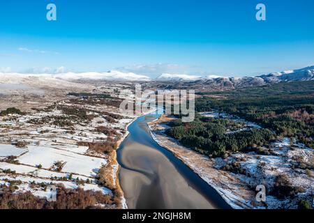 Aerial view of snow covered Gweebarra River between Doochary and ...
