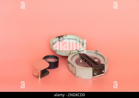 Geological fieldwork tools: hammer, compass, magnifying glass, rock ...