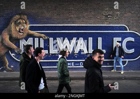 Millwall fans walk past a mural as they make their way to the stadium ...