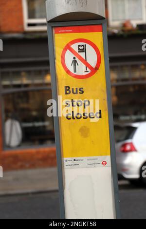 Bus Stop Closed Sign, Shoreditch, London, England Stock Photo - Alamy
