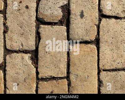 Yellow stone tiles masonry closeup background. the texture of yellow ...