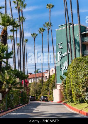 A picture of The Beverly Hills Hotel's sign on its facade and the ...