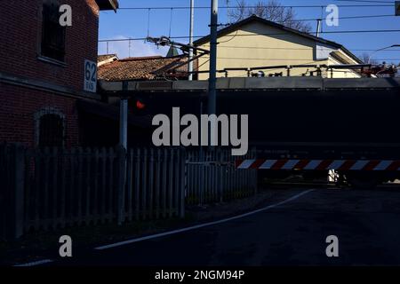 Railroad crossing in an italian town Stock Photo - Alamy