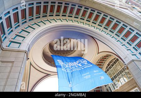 The six-story arch at Rowes Wharf Building shelters a public plaza at ...