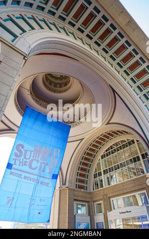 The six-story arch at Rowes Wharf Building shelters a public plaza at ...