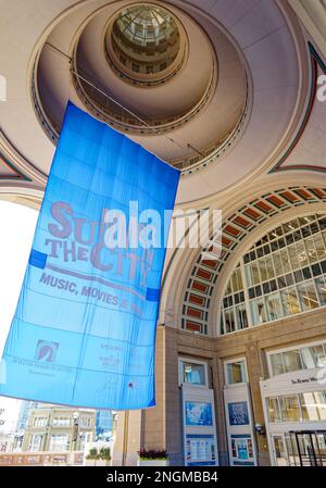The six-story arch at Rowes Wharf Building shelters a public plaza at ...
