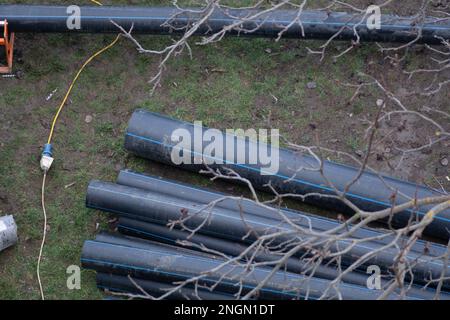 Sanitary piping. Plastic stacked PVC plastic industrial pipes on ...