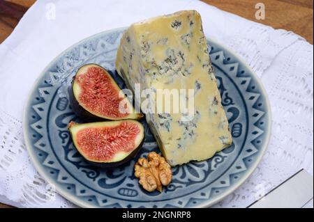 Cheese collection, English old stilton blue cheese close up served with ...