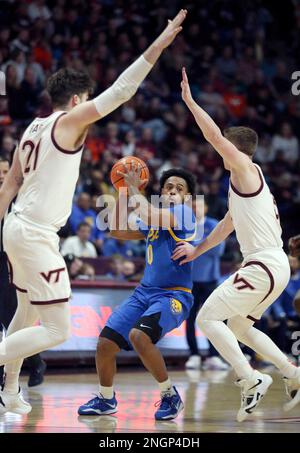 Virginia Tech's Grant Basile, left, defends as Pittsburgh's Jamarius ...