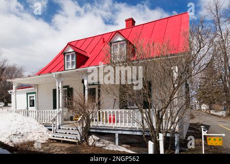 Old 1835 white wood plank with green trim house facade with red sheet ...