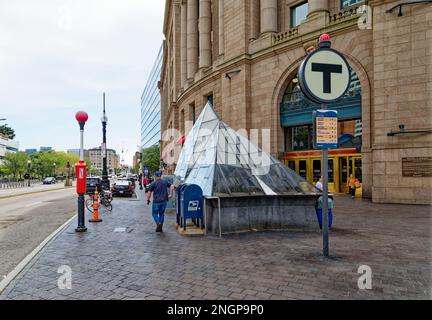 Modern concrete and glass subway entrances outside the neoclassical ...