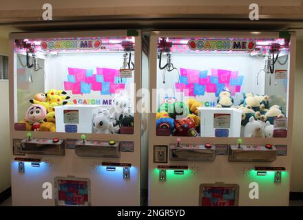 Arcade claw game machines with Pokemon characters Stock Photo - Alamy