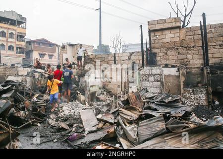 Quezon City, Philippines. 19th Feb, 2023. Residents are seen on the ...