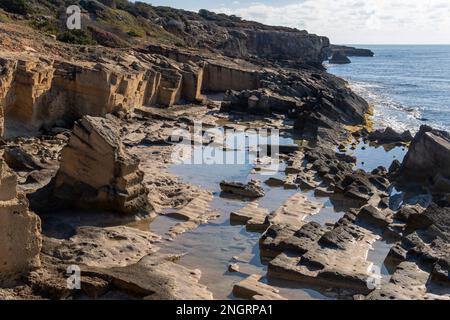 Old quarry of the Mallorcan mares stone, on the rocky coast of the ...