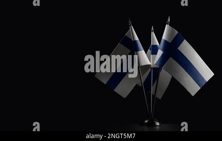 Small national flags of the Finland on a black background Stock Photo ...