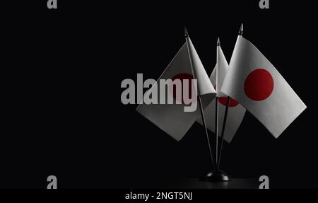 Small national flags of the Japan on a white background Stock Photo - Alamy