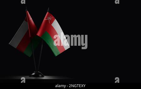 Small national flag of the Oman on a black background Stock Photo - Alamy