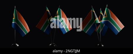 Small flags of the South Africa on an abstract blurry background Stock ...
