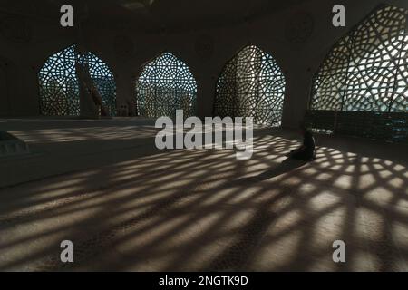Islamic photo. Shadows of the decoration of the window on the ground in ...