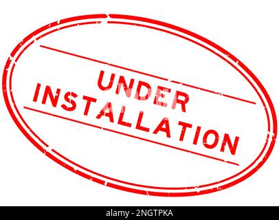 Grunge red under installation word hexagon rubber seal stamp on white ...