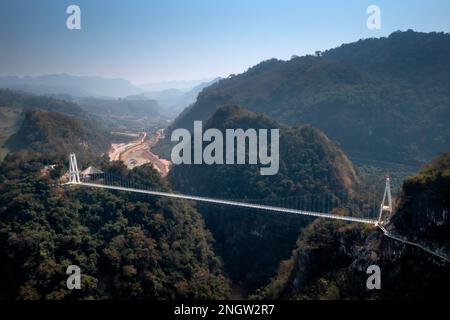 Admire the Bach Long Glass Bridge in the sunset from above. This is the ...
